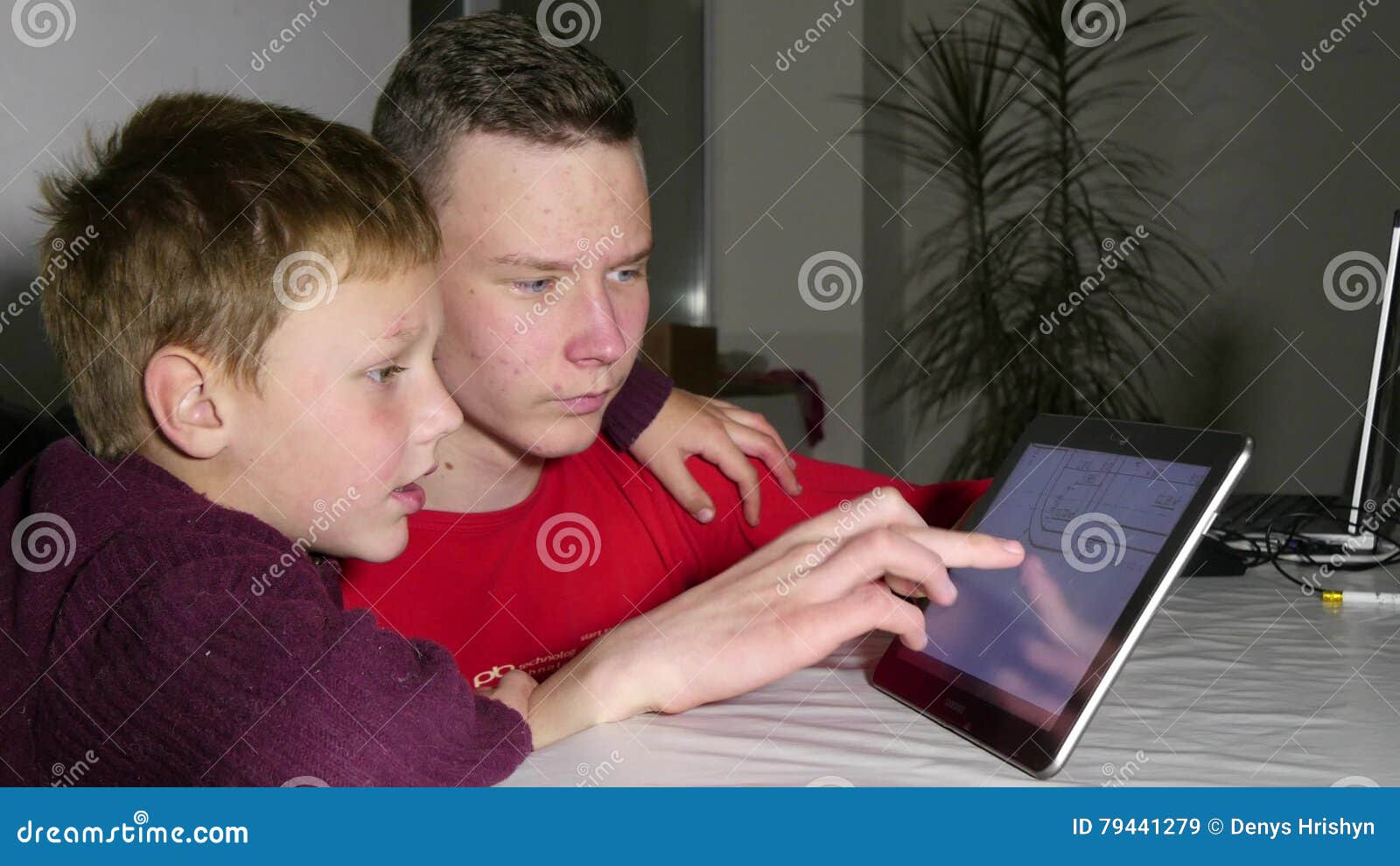Brothers Using Tablet while Working with Blueprint Stock Video - Video ...