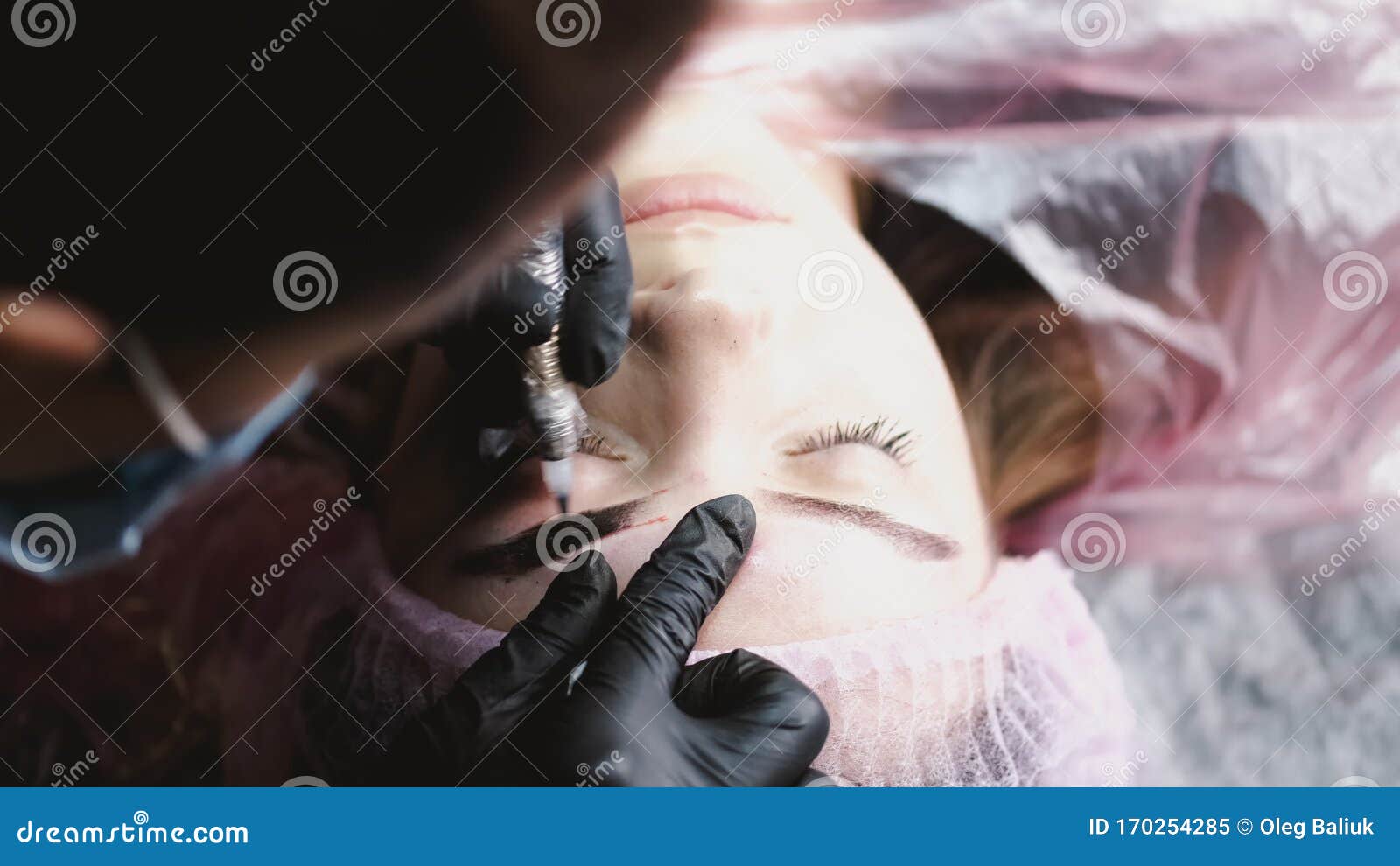 The Brow Artist is Dying the Eyebrows with a Tool Stock Video - Video ...