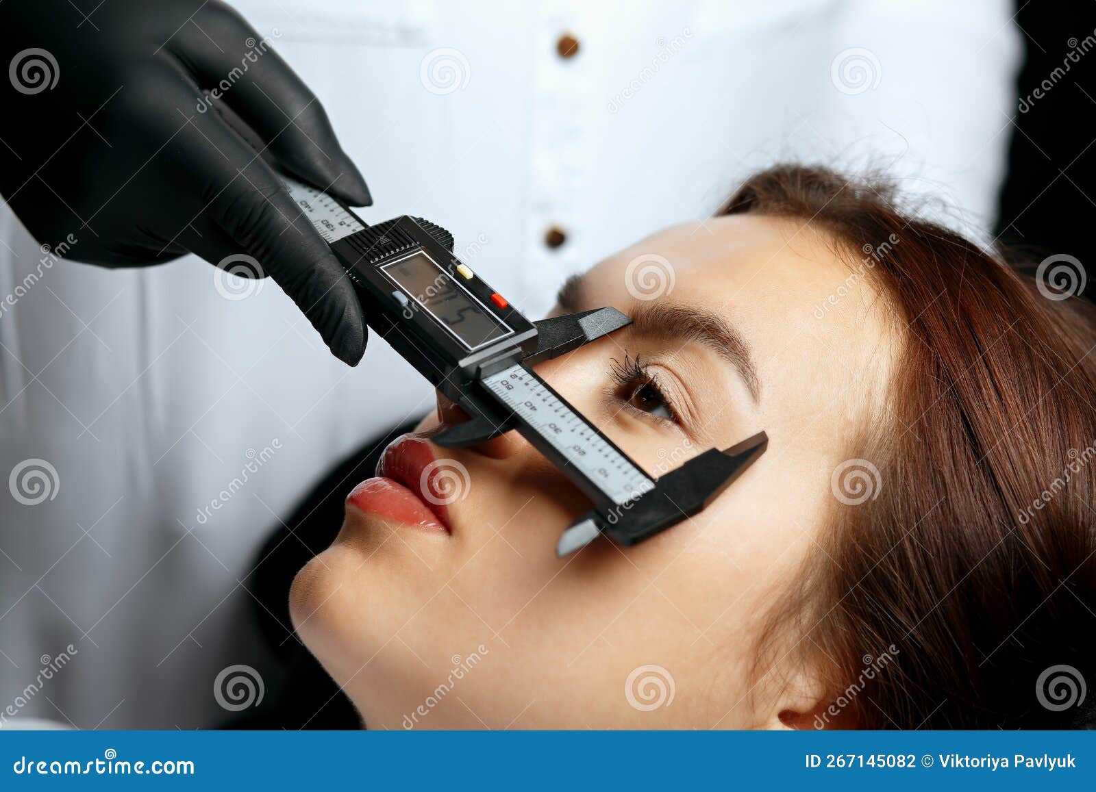 Brow Specialist Forming the Shape of the Eyebrows before the Permanent ...