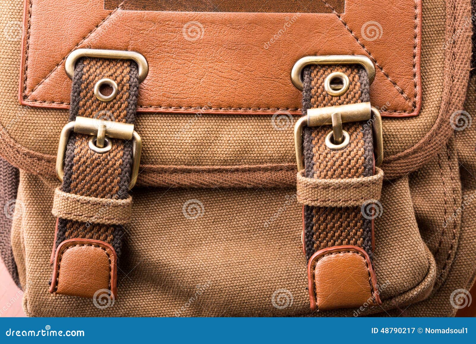 Brown backpack buckle stock image. Image of lenses, clothes - 48790217