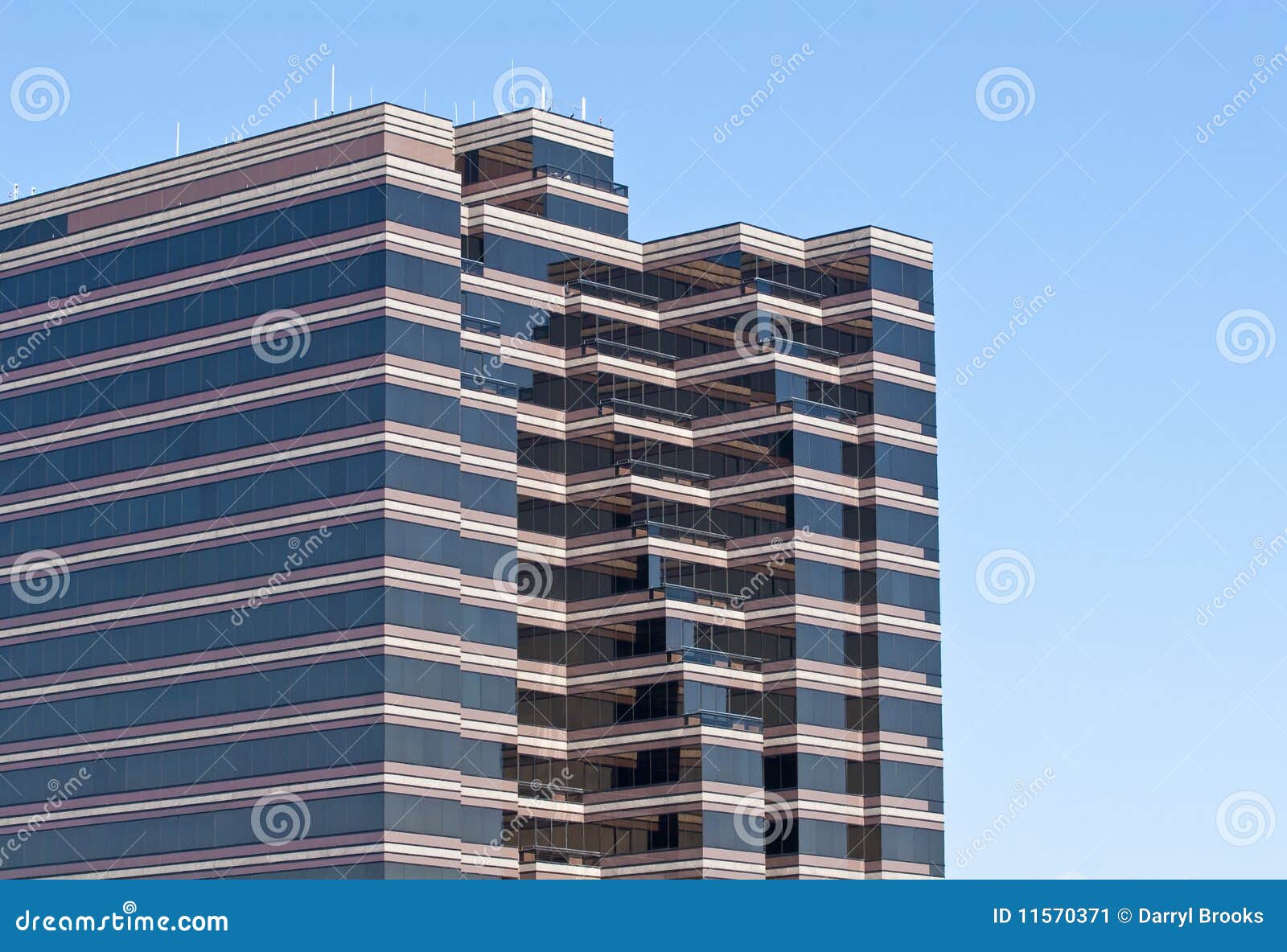 Brown and Beige Striped Building on Blue Stock Image - Image of ...