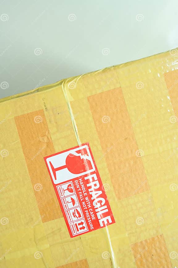 Brown Box Packaging with Warning Symbol Stock Image - Image of board ...