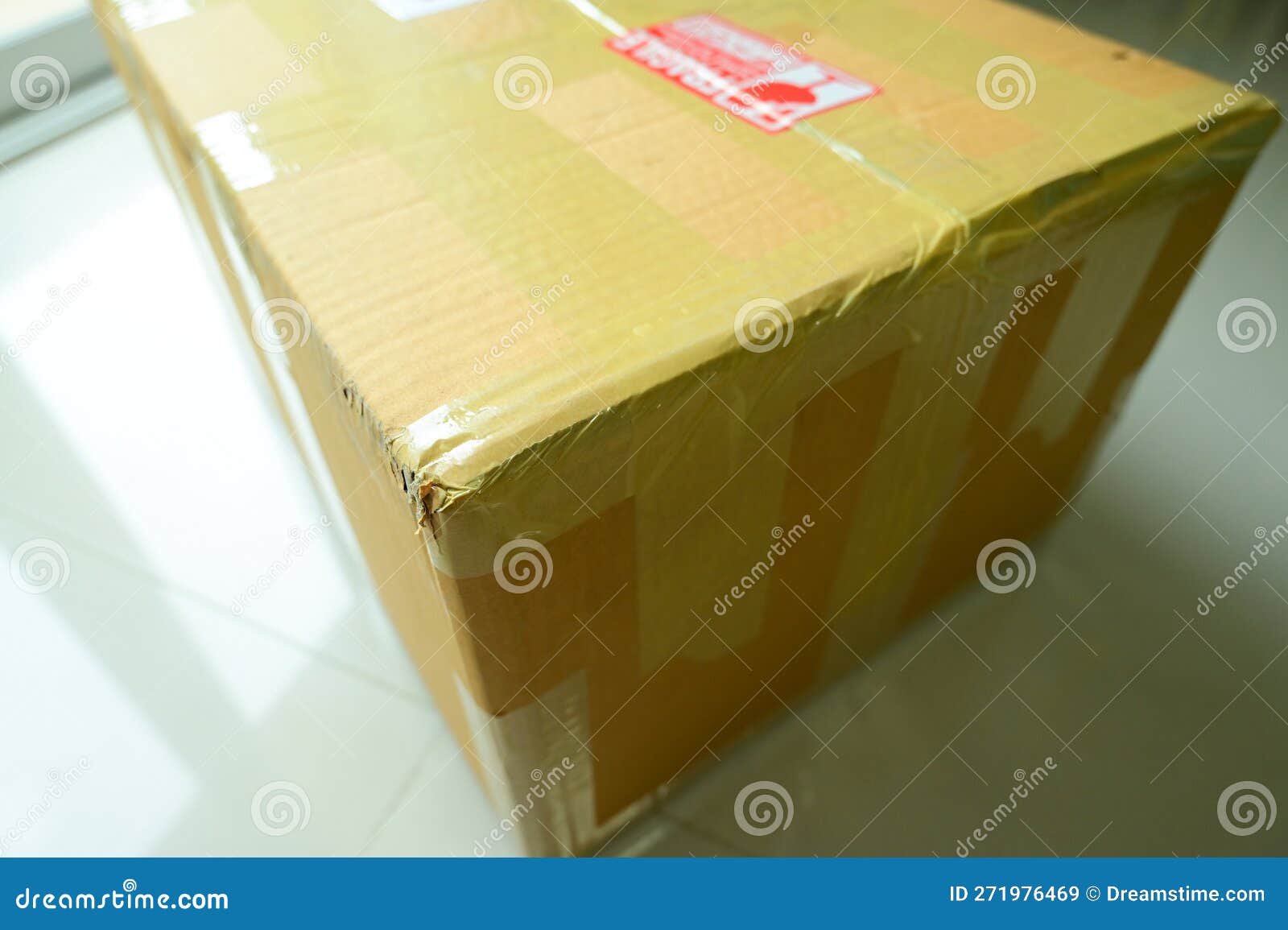 Brown Box Packaging with Warning Symbol Stock Image - Image of package ...