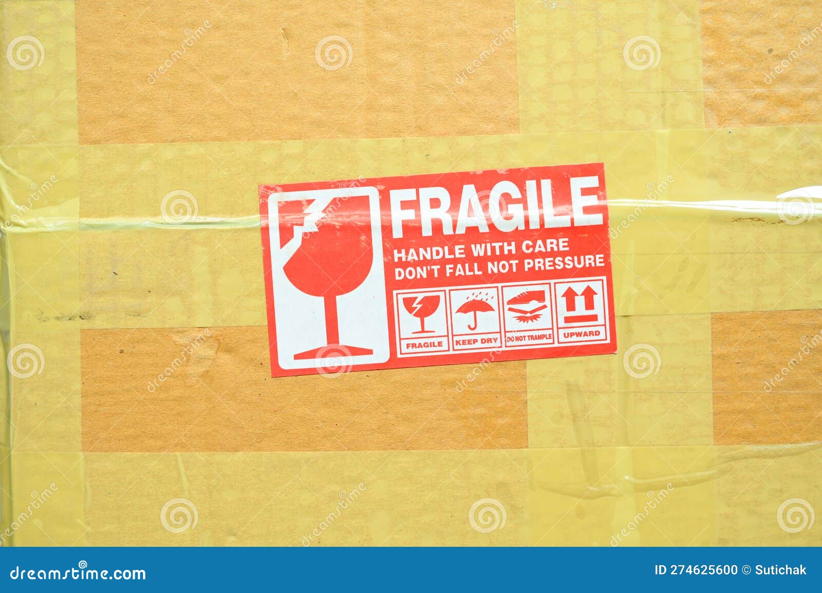 Brown Box Packaging with Warning Fragile Symbol Stock Photo - Image of ...