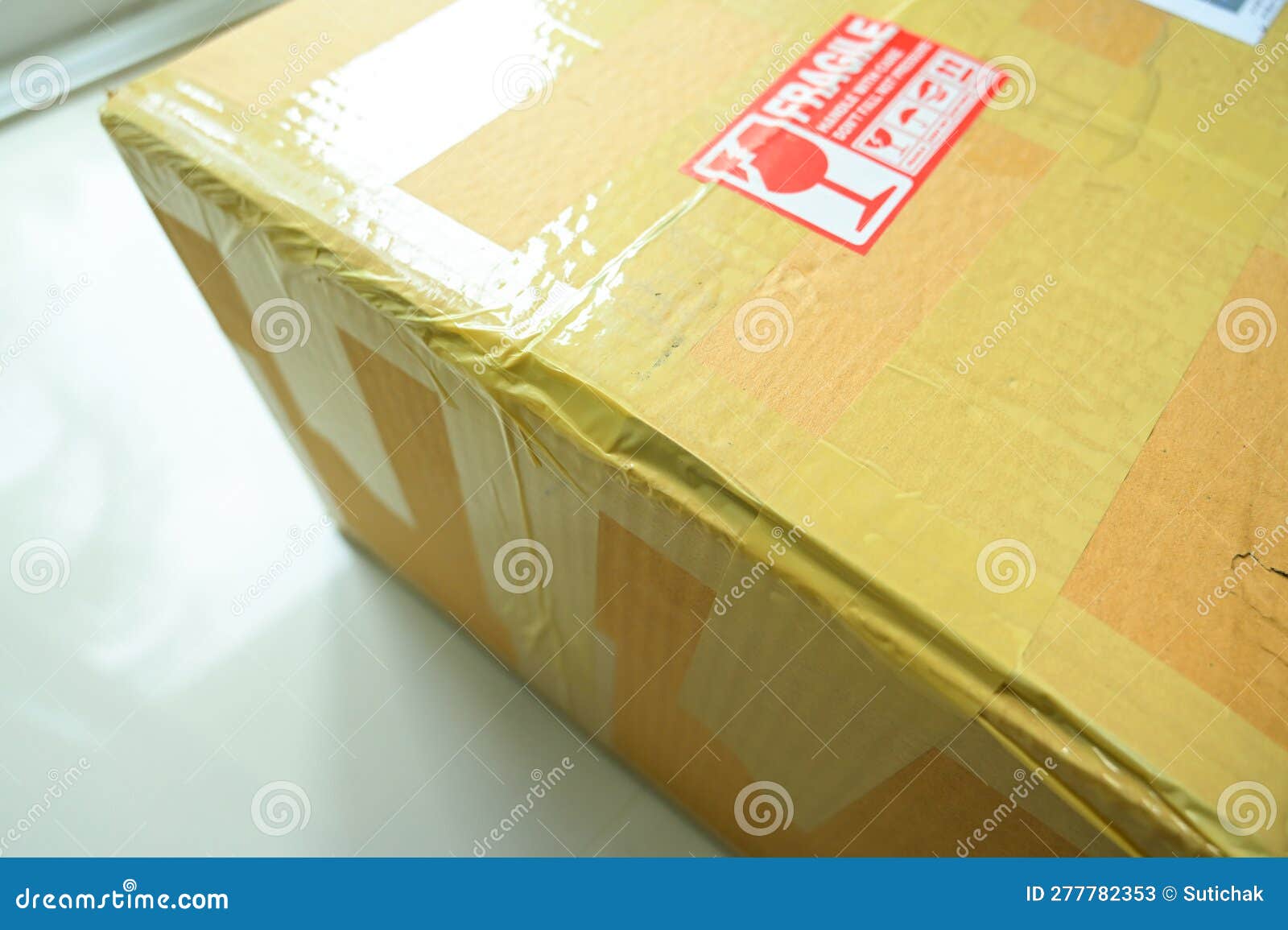 Brown Box Packaging with Warning Symbol Stock Image - Image of fragile ...