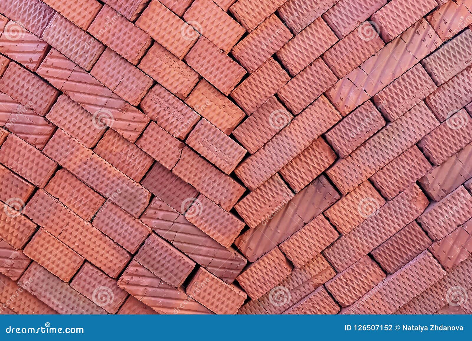 Brown Bricks Folded into a Pile, a Background from Bricks. Stock Photo ...