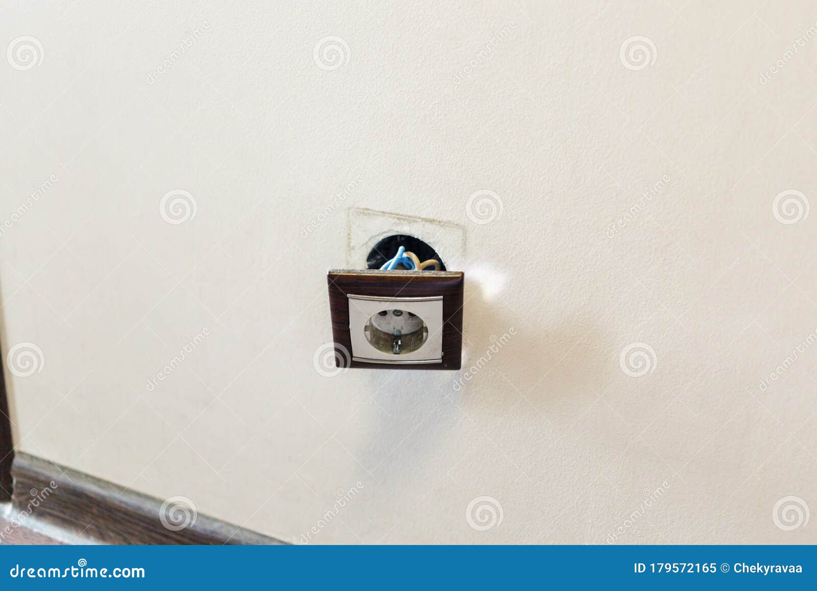 Brown Broken Electrical Socket Fell Out Of The Wall. The Socket Is Torn ...