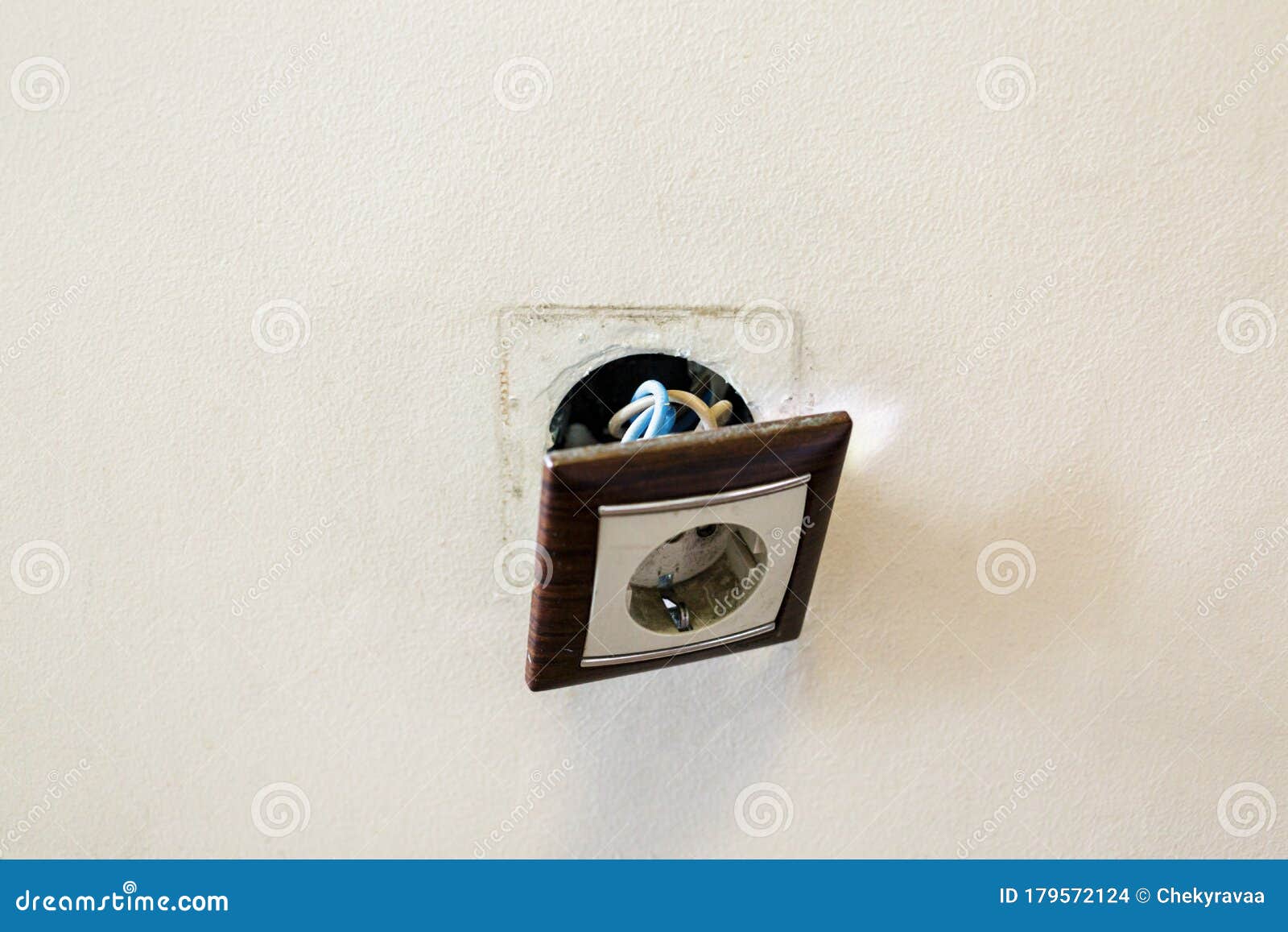 Brown Broken Electrical Socket Fell Out Of The Wall. The Socket Is Torn ...