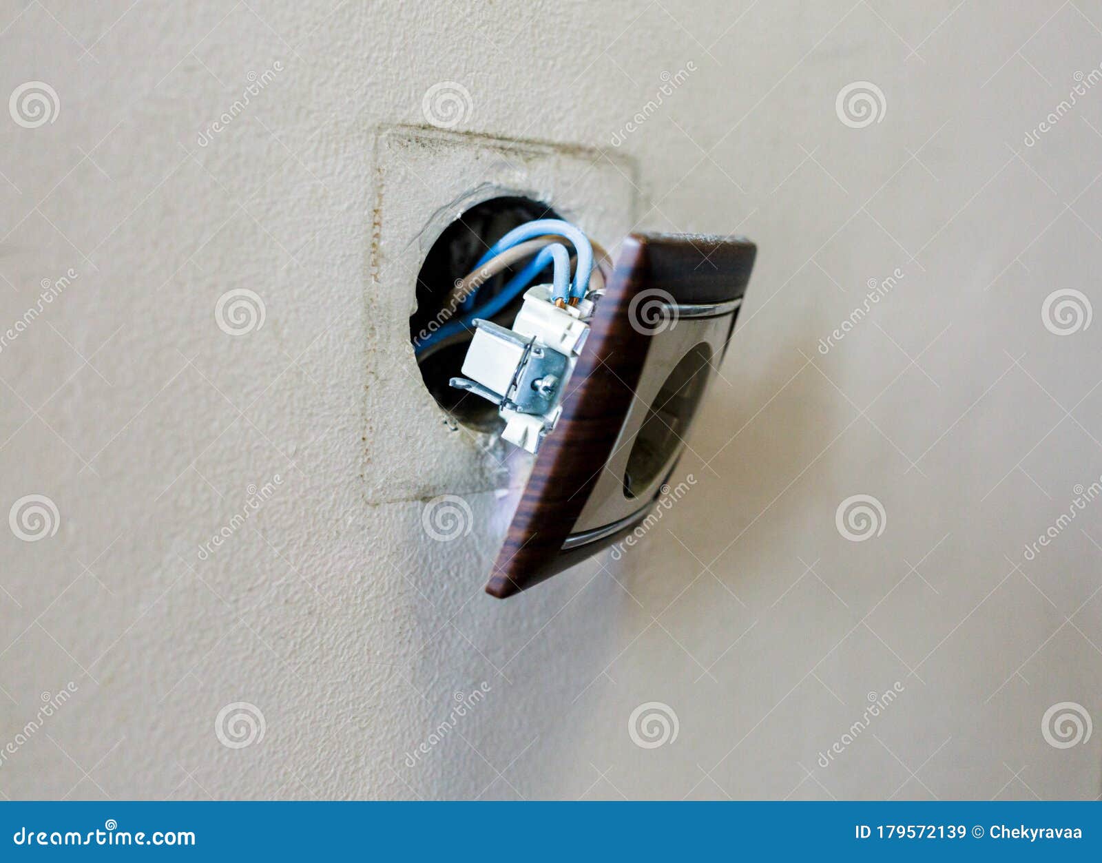 Brown Broken Electrical Socket Fell Out Of The Wall. The Socket Is Torn ...