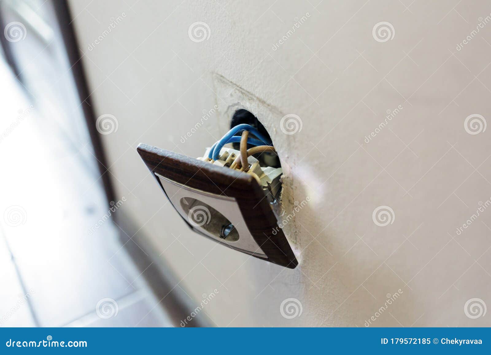 Brown Broken Electrical Socket Fell Out of the Wall. the Socket is Torn ...