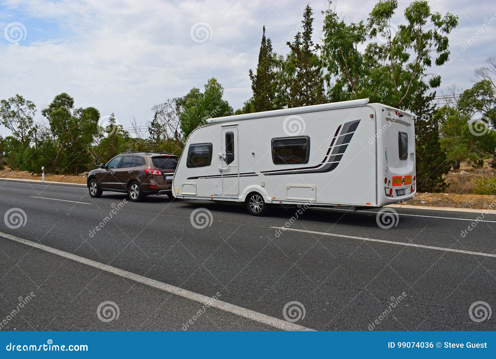Car Towing a Caravan stock photo. Image of wheel, white - 99074036