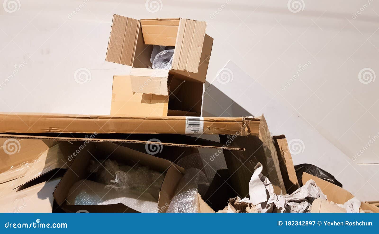 Brown Cardboard Boxes are Stacked for Recycling. Photo of Waste Paper ...