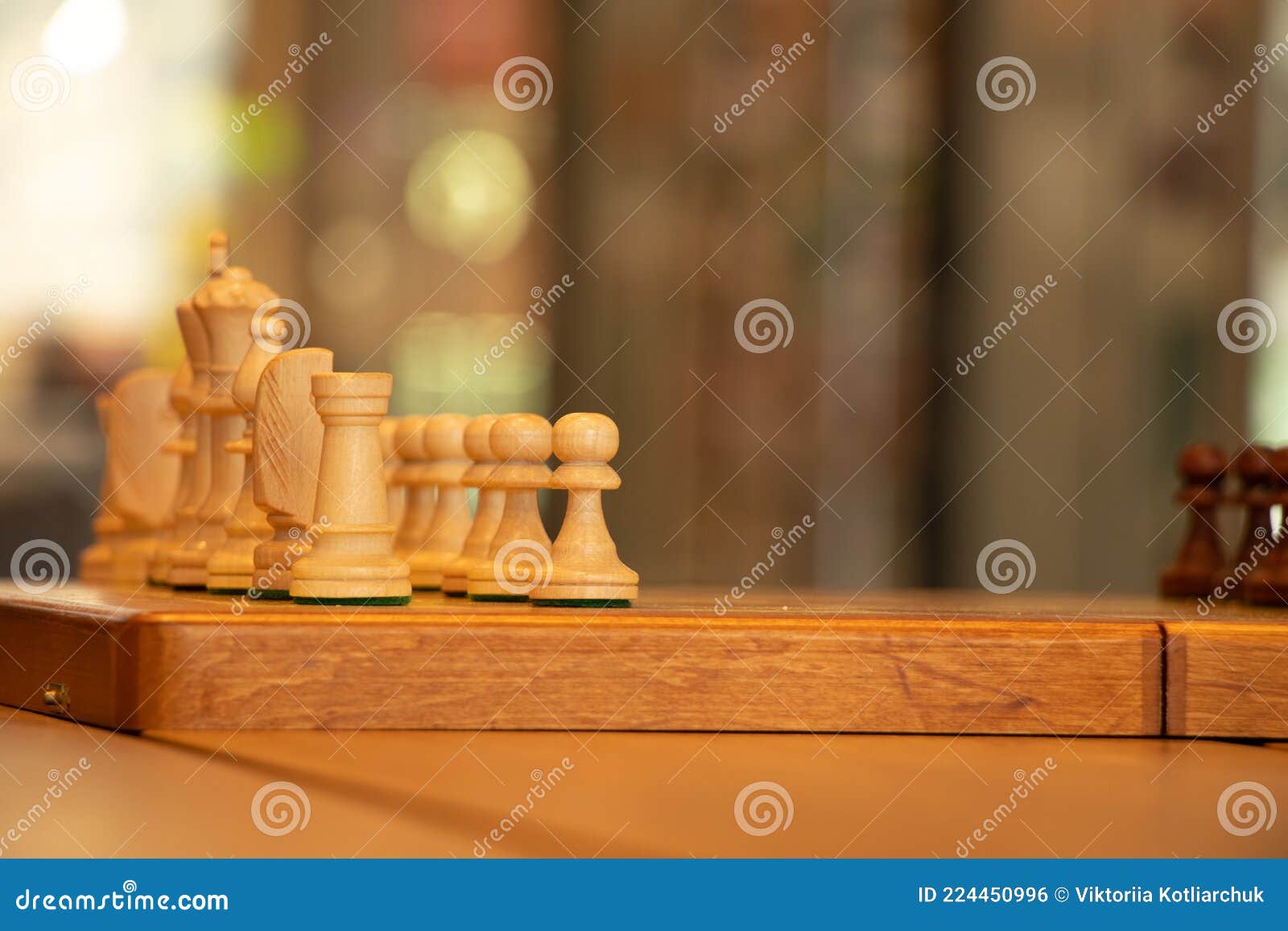 Brown Chess Board with Figures on a Wooden Table in a Cafe Stock Photo ...
