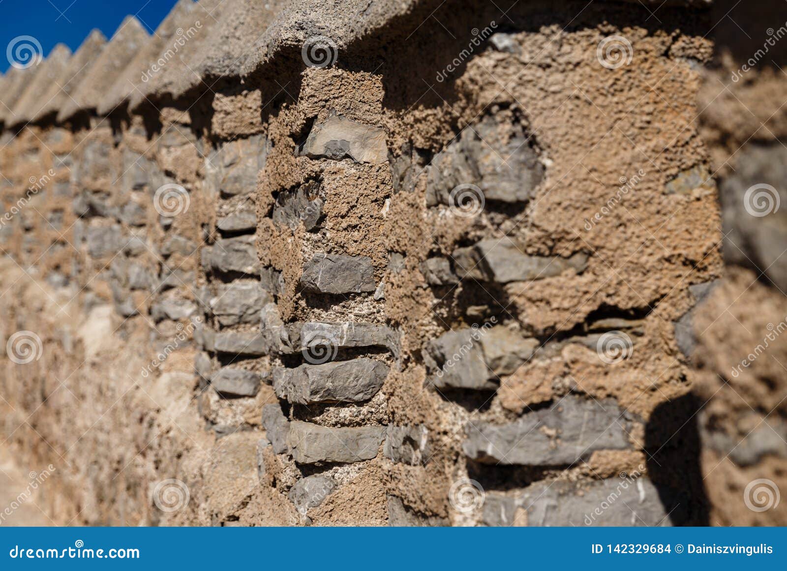 Brown Columns Made of Stones in One Long Row Stock Photo - Image of ...