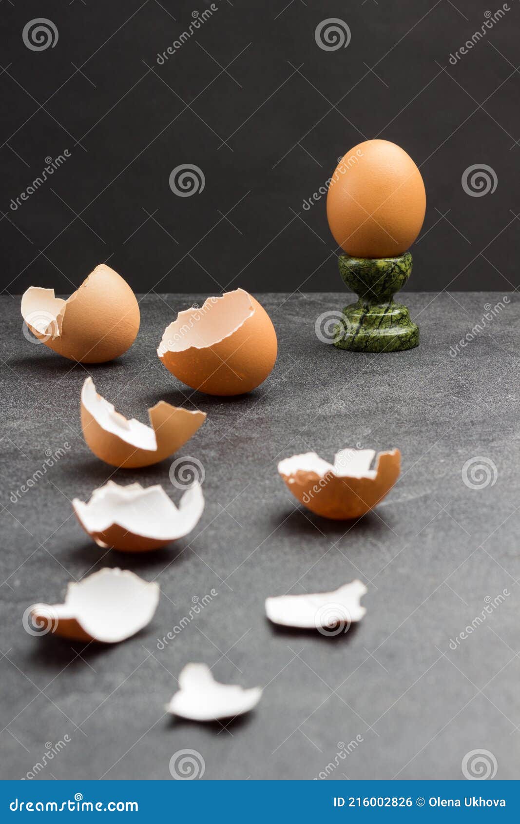Brown Egg on Egg Stand. Eggshells on Table Stock Photo - Image of ...
