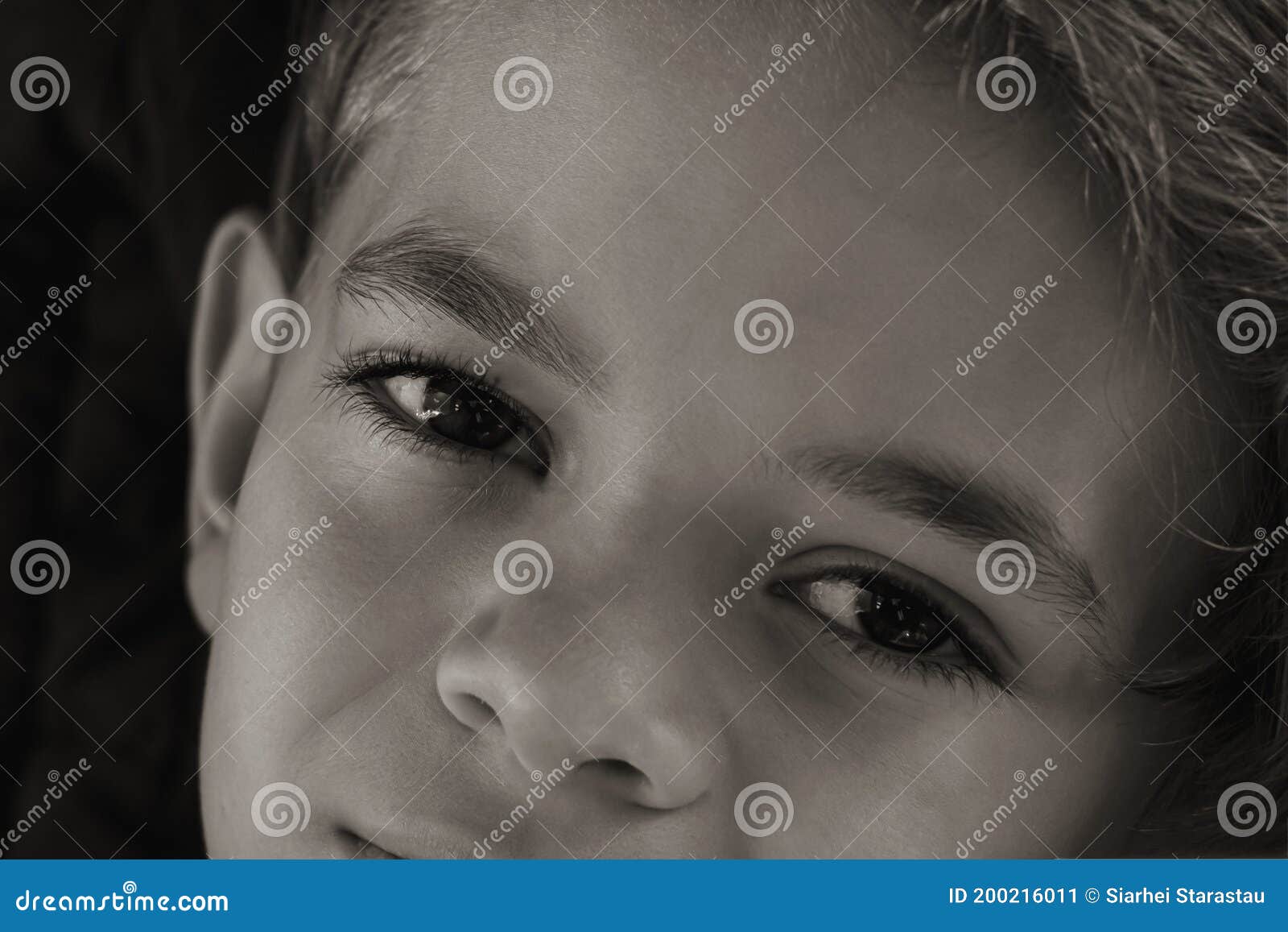Brown Eyes of a Little Boy in the Dark Stock Image - Image of front ...