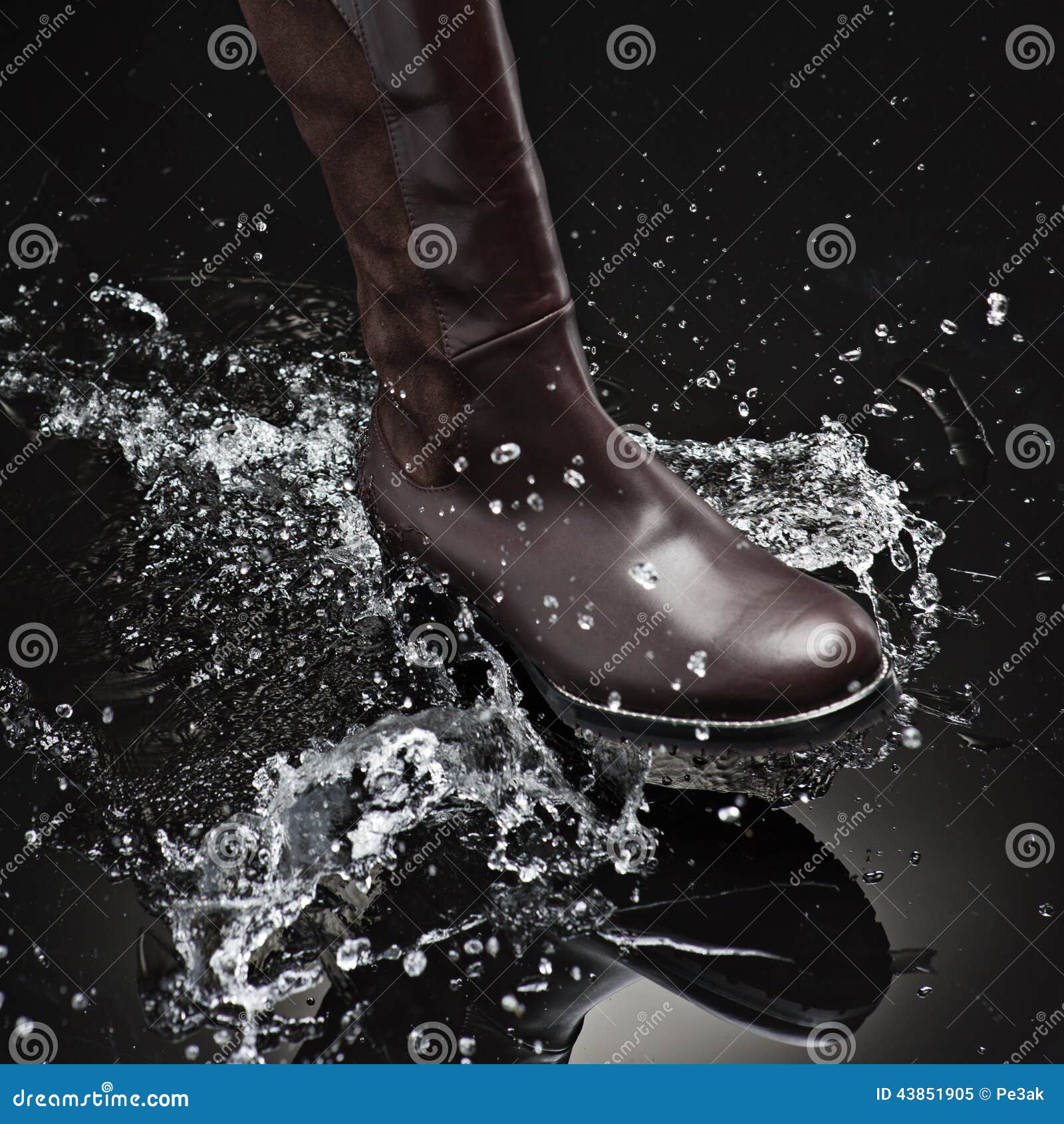 Brown Female Boot Splashing Water Stock Image - Image of shoes, fall ...