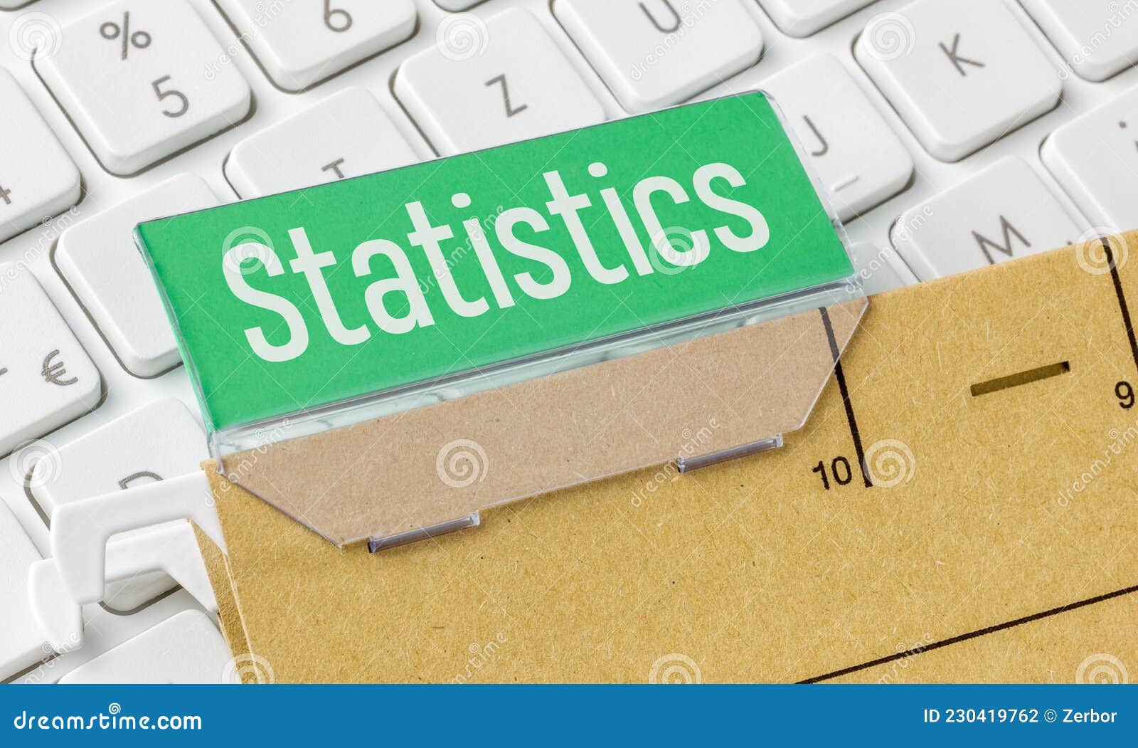 A Brown File Folder Labeled Statistics Stock Photo - Image of keyboard ...