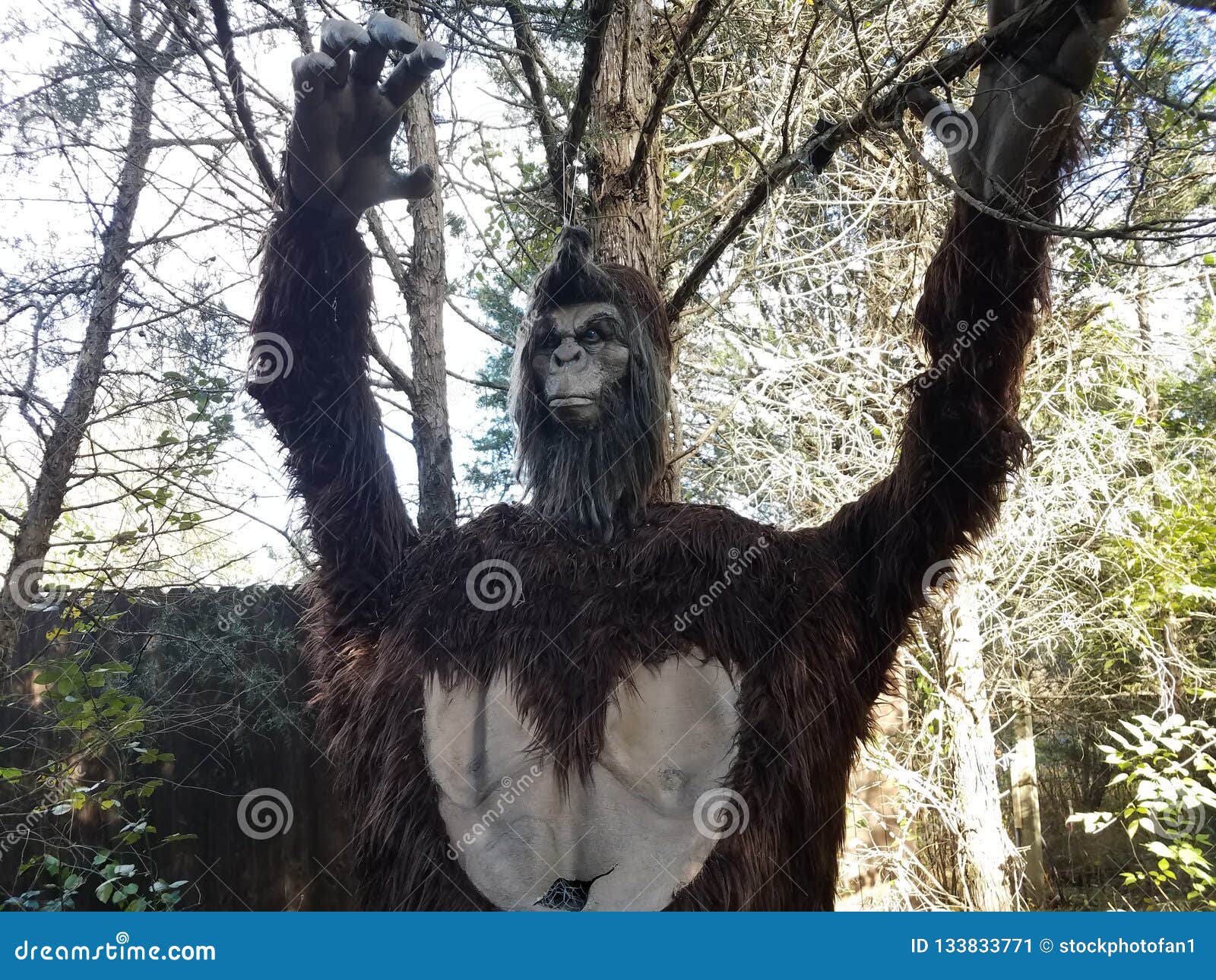 Brown Furry Ape Creature in Forest or Woods Stock Image - Image of ...