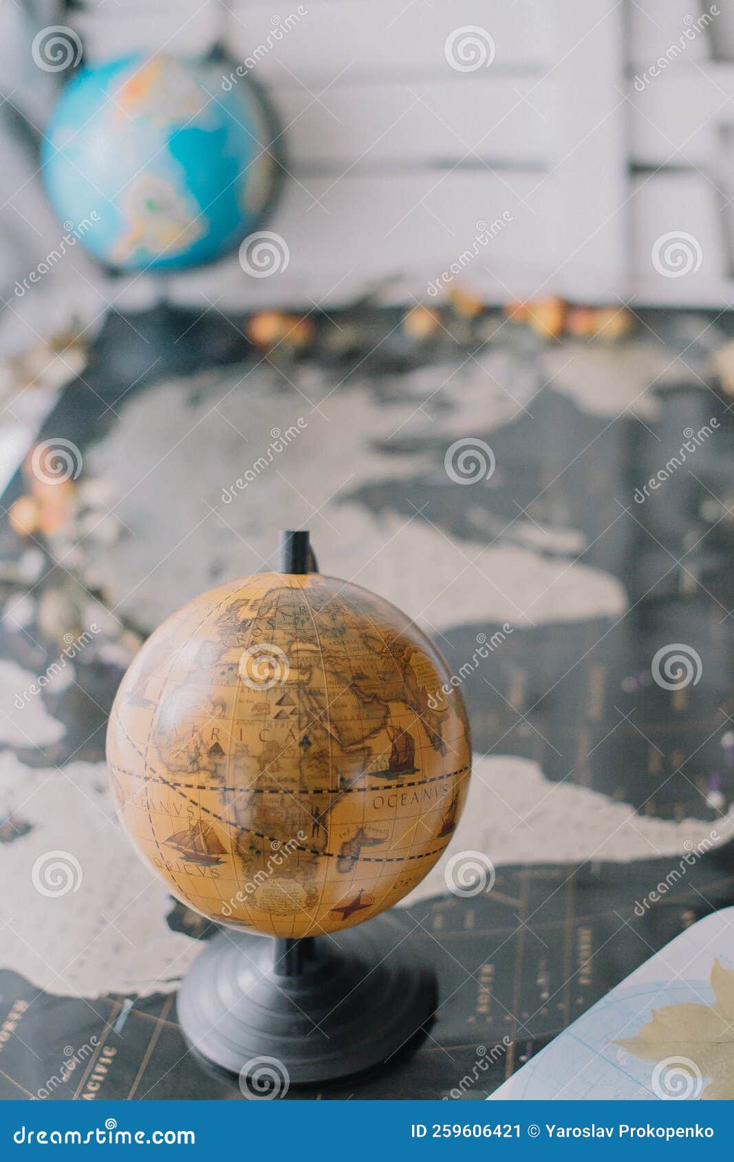 Brown Globe on World Map with Blurred Background Stock Image - Image of ...
