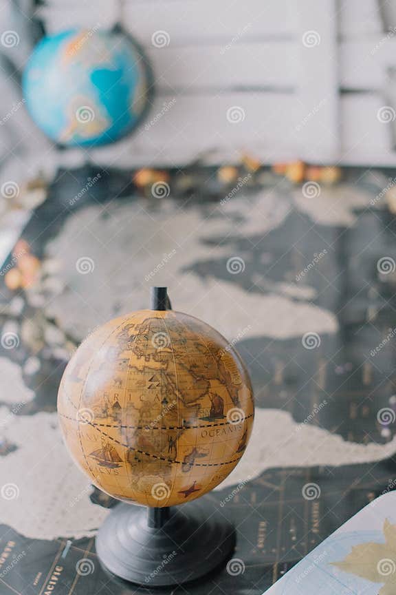 Brown Globe on World Map with Blurred Background Stock Image - Image of ...