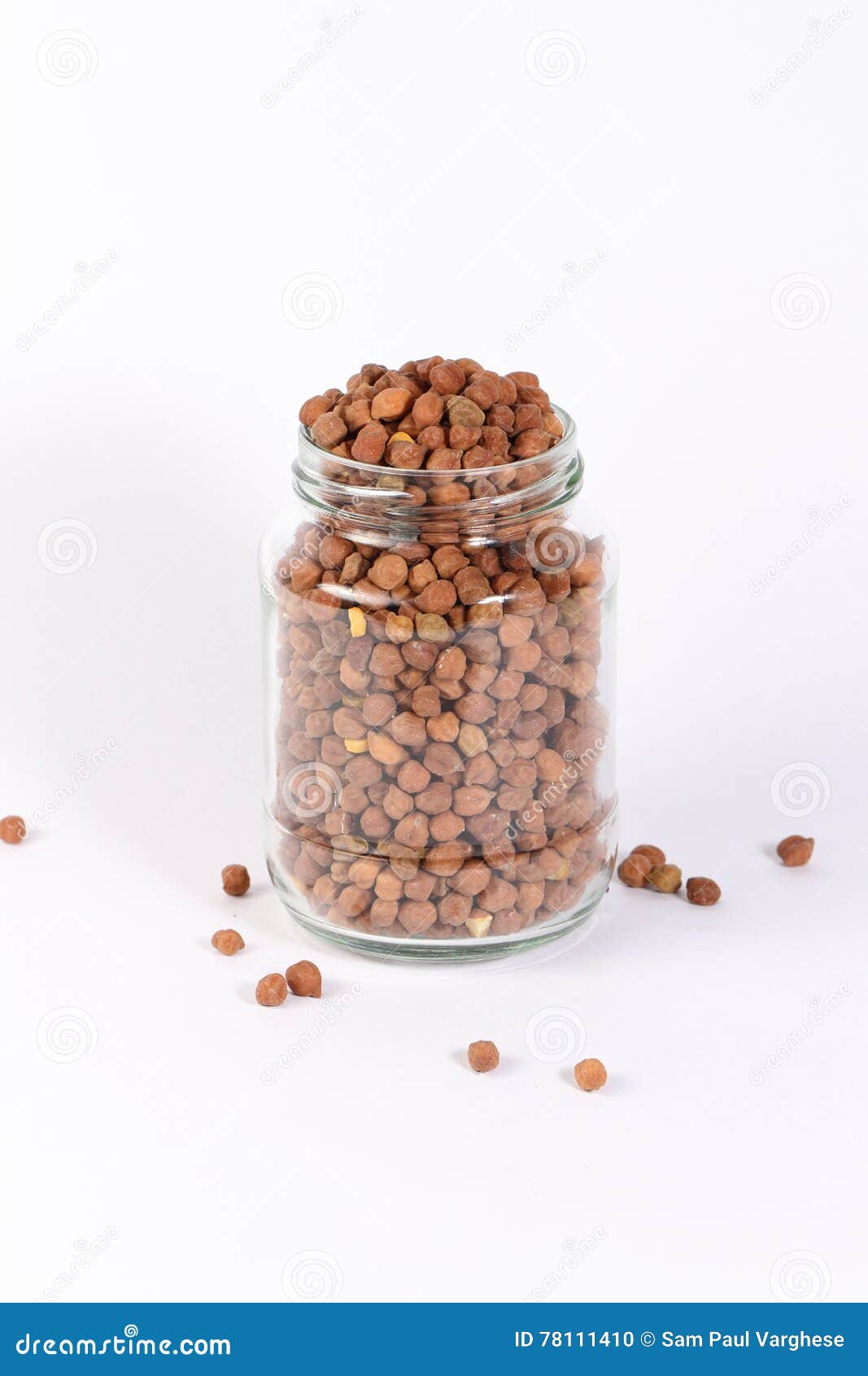 Brown grams in glass jar stock photo. Image of crowded - 78111410