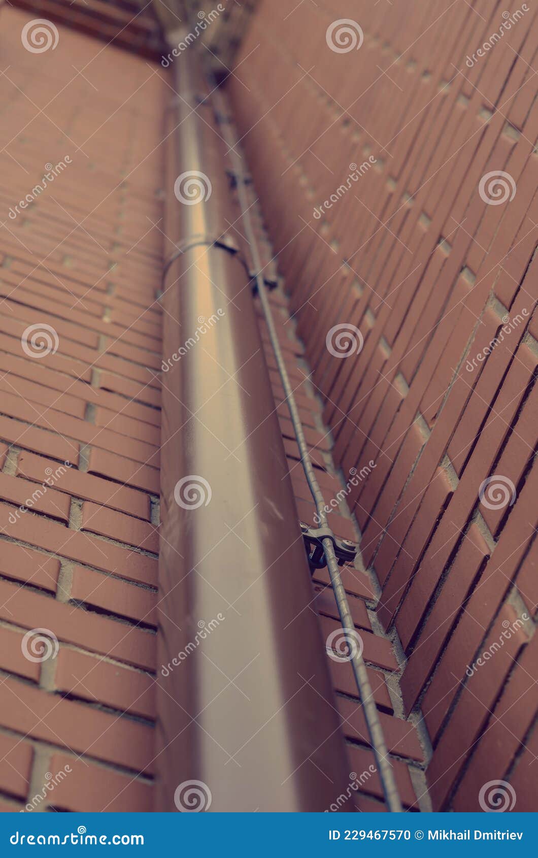 Brown New Gutter Metal System Pipe. Vertical Construction For Draining ...