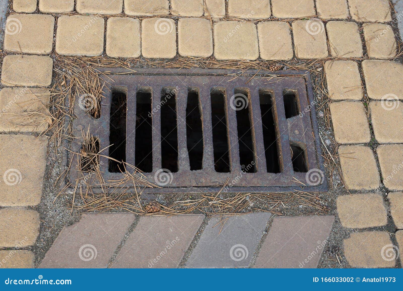 Brown Iron Drain Grate on Pavement Road Stock Photo - Image of path ...