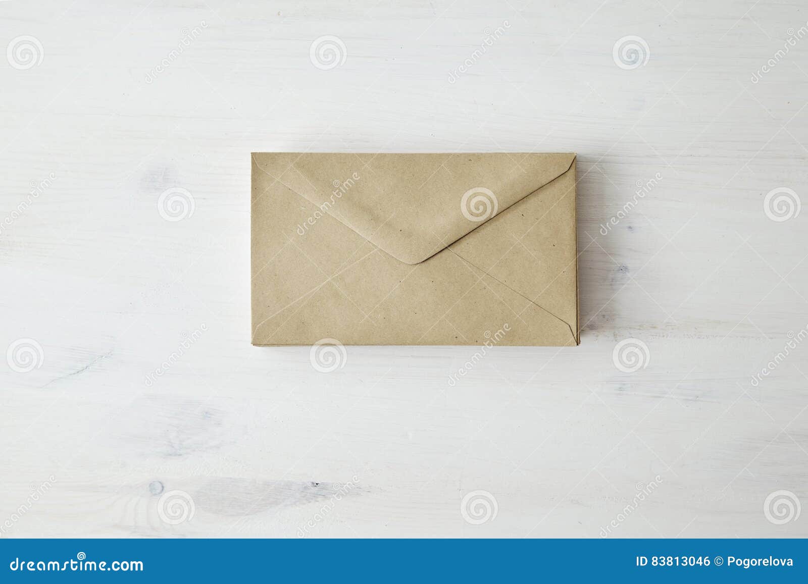 Brown Kraft Paper Post Envelope on Wood Table Stock Photo - Image of ...
