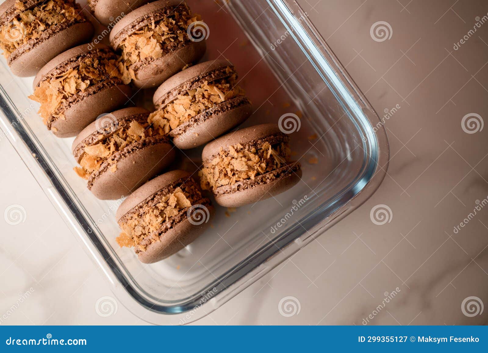 Brown Macaroons Decorated with Cornflakes Lie in a Glass Container, Top ...