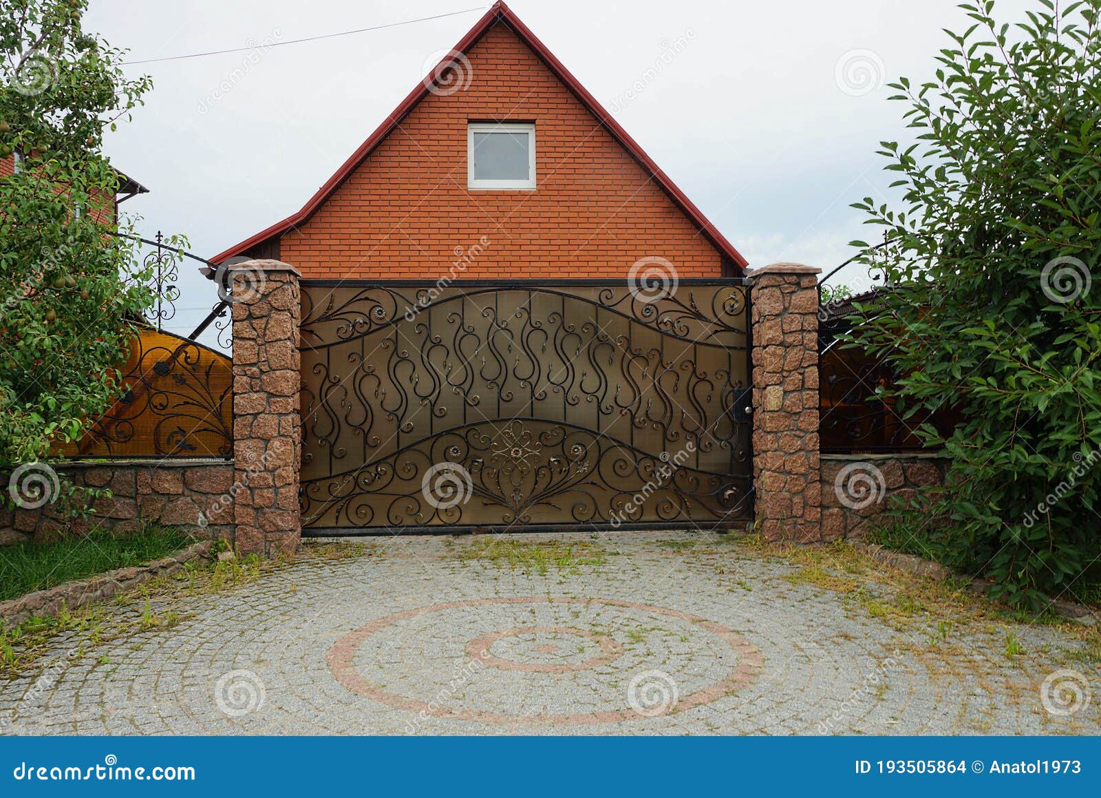 Brown Metal Gate with a Black Forged Pattern Stock Photo - Image of ...
