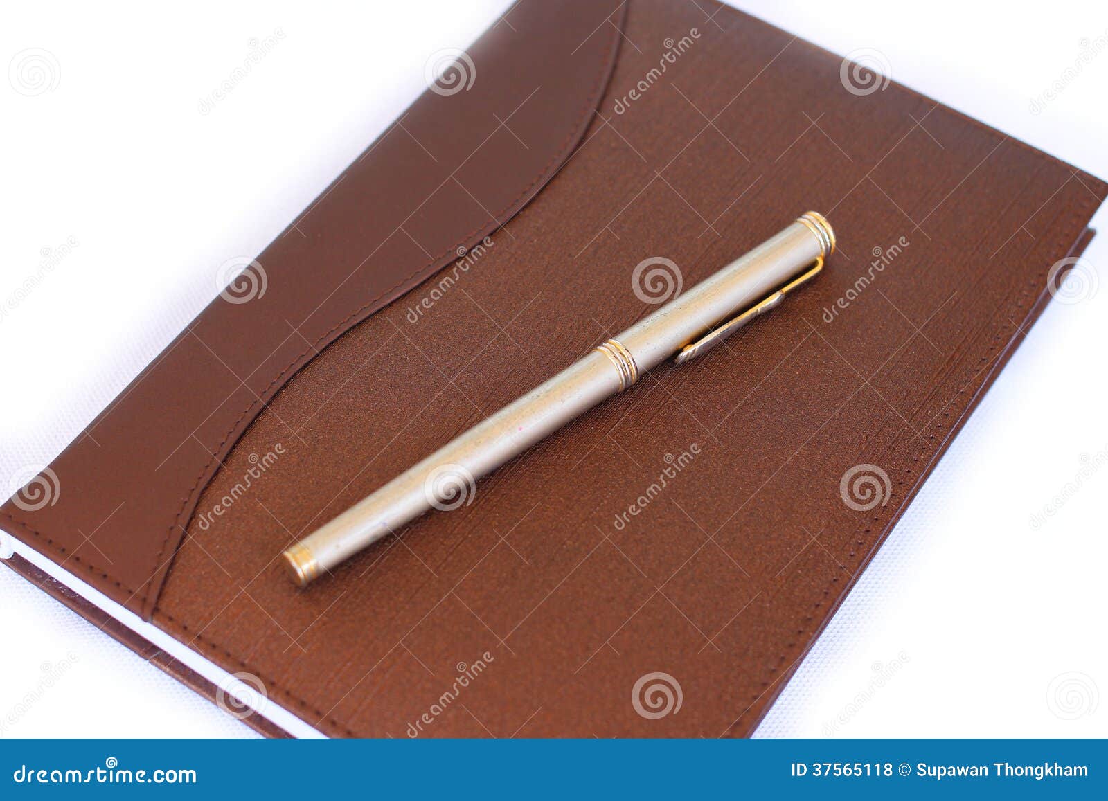 Brown note book and pen stock photo. Image of office - 37565118