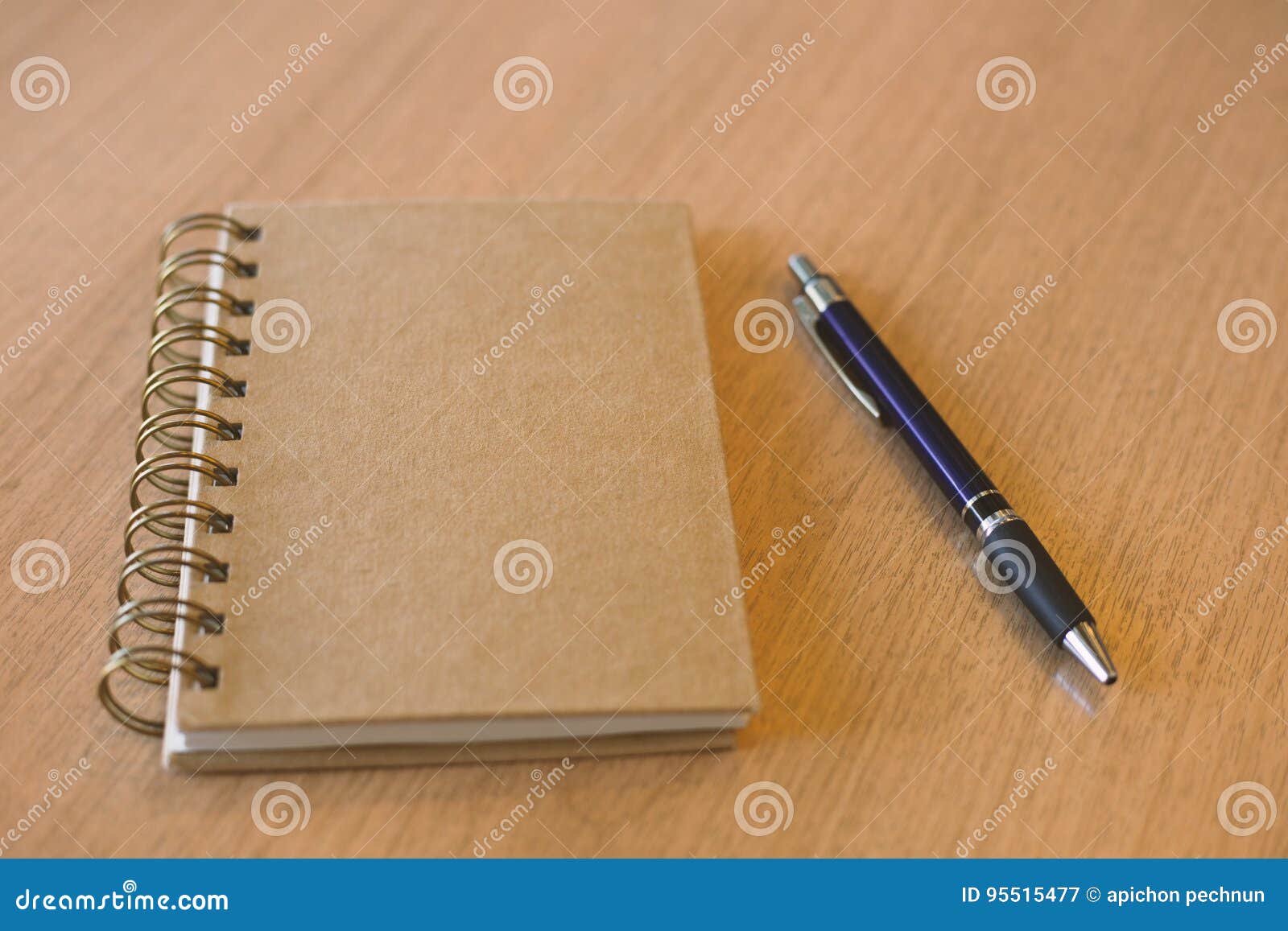 Brown Notebook with Pen on Wooden Stock Image - Image of open, notepad ...