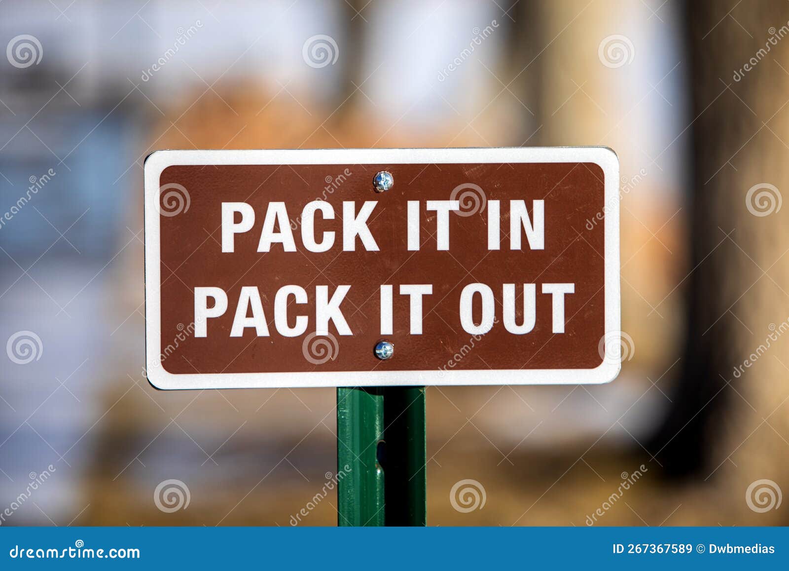 A Brown, Pack it in, Pack it Out Sign with White Lettering and White ...