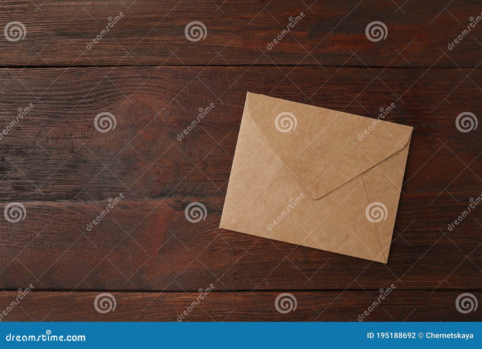 Brown Paper Envelope on Wooden Table. Space for Text Stock Photo ...