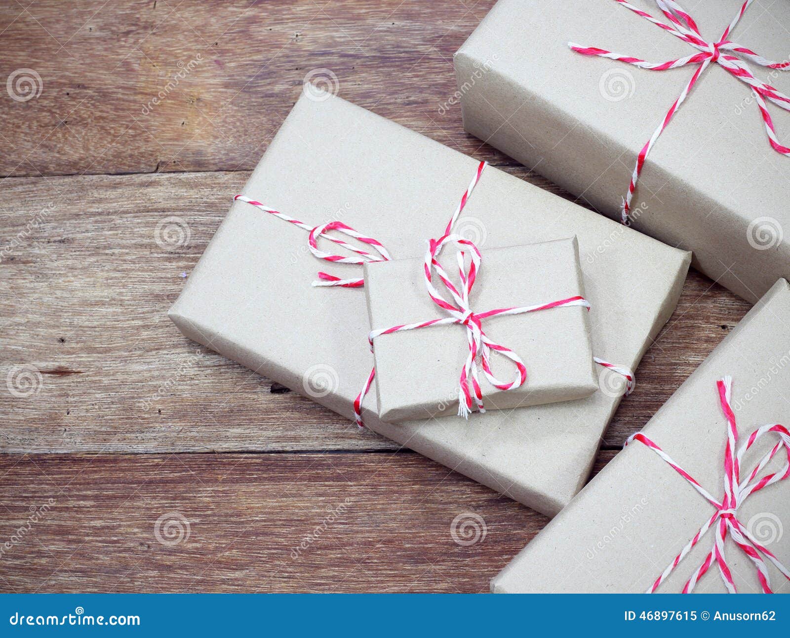 Brown Paper Parcel Tied with Red and White String Stock Image - Image ...