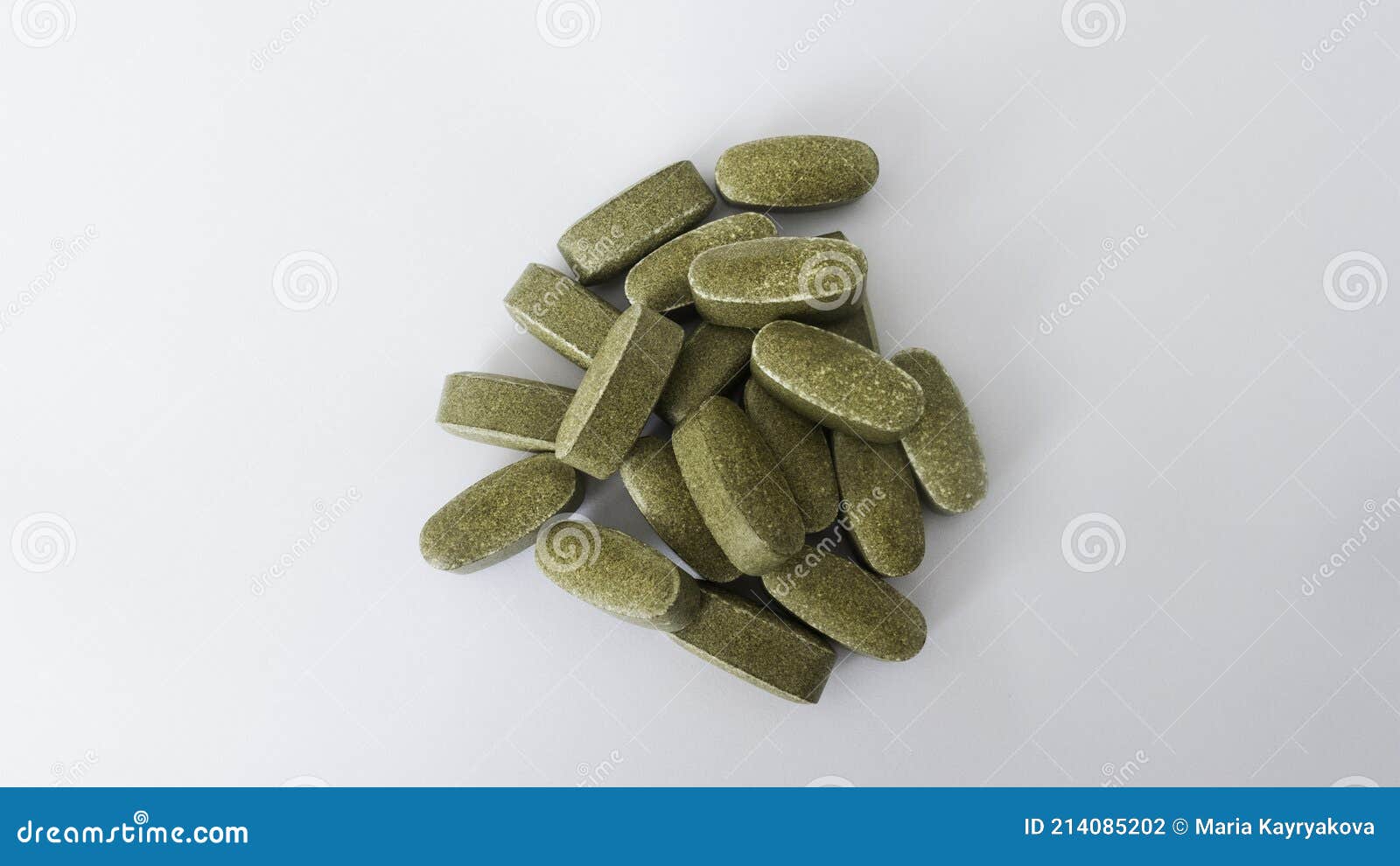 Brown Pills on the White Surface Stock Photo - Image of food, yellow ...