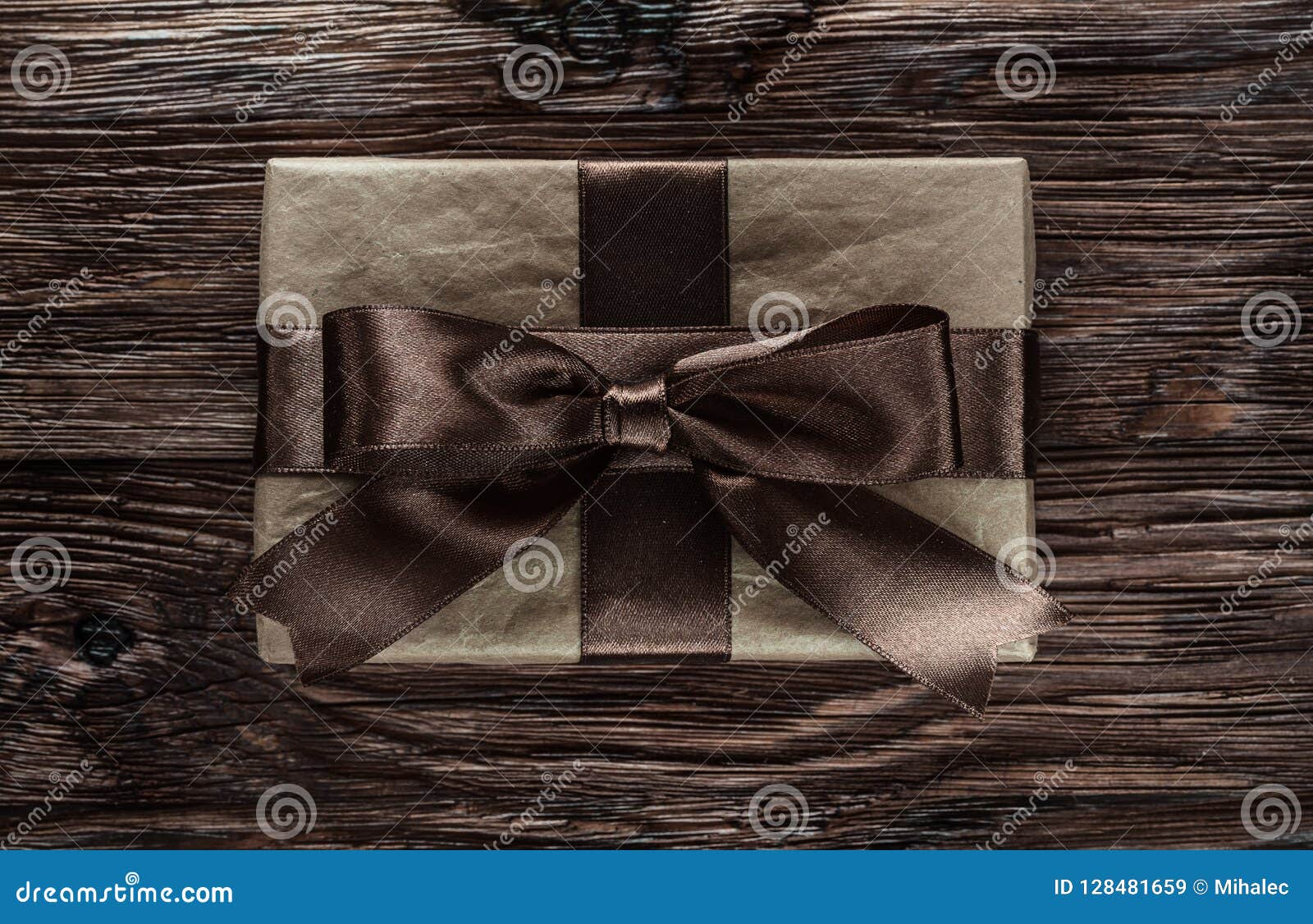 Brown Present Box on Vintage Wooden Board Stock Image - Image of ...
