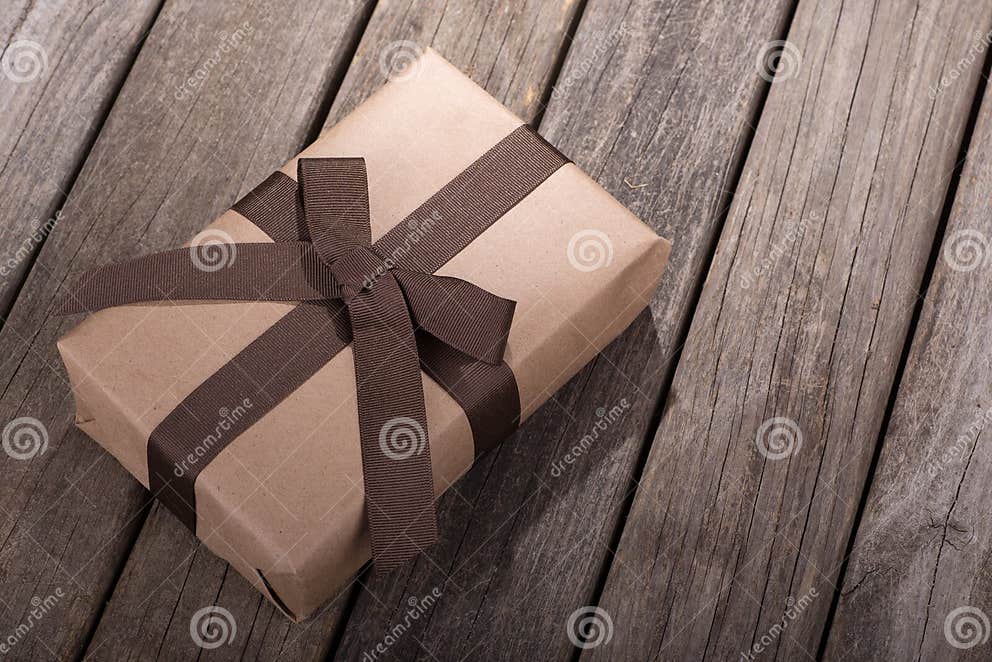 Brown Present stock photo. Image of board, ribbon, valentine - 55699934