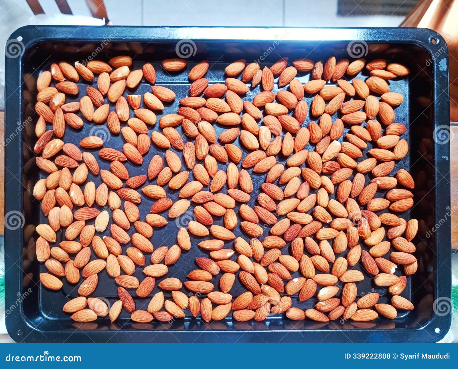Brown Raw Almonds in a Black Container Stock Photo - Image of dish ...