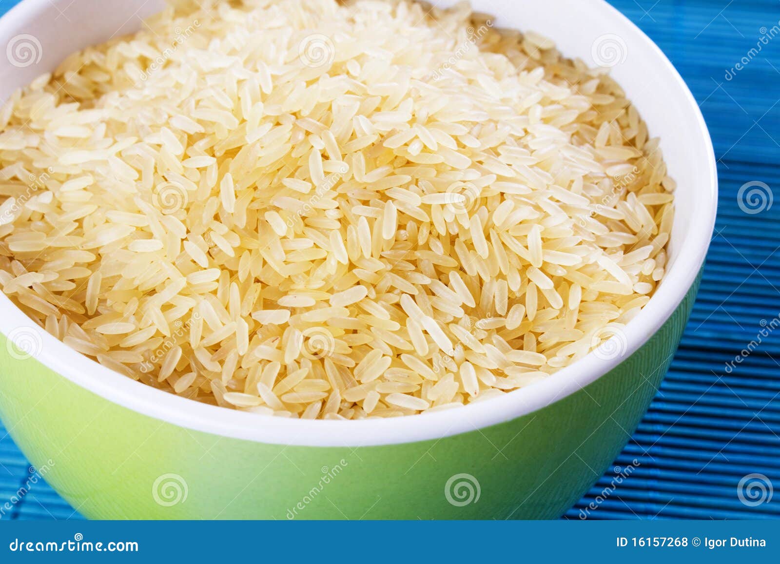 Brown rice in a bowl stock photo. Image of photograph - 16157268