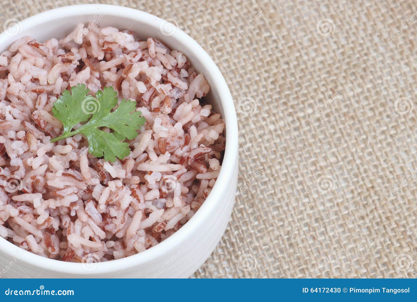 Brown rice in bowl stock photo. Image of cereal, close - 64172430