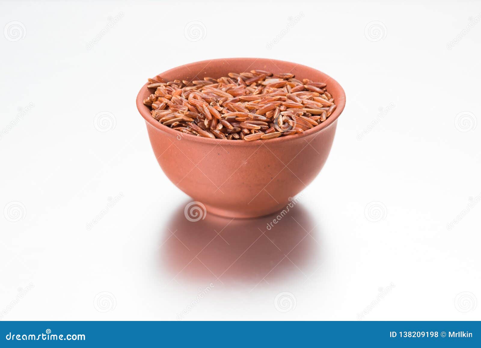 Brown Rice in a Clay Cup on a White Background Stock Photo - Image of ...