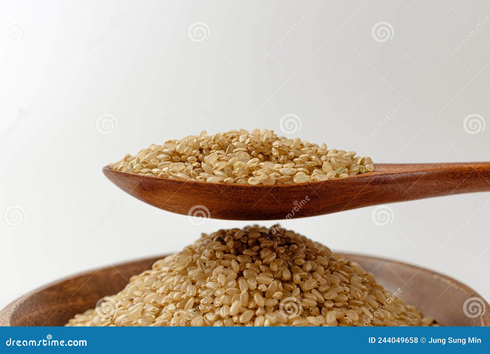 Brown Rice on a White Background Stock Photo - Image of meal, healthy ...