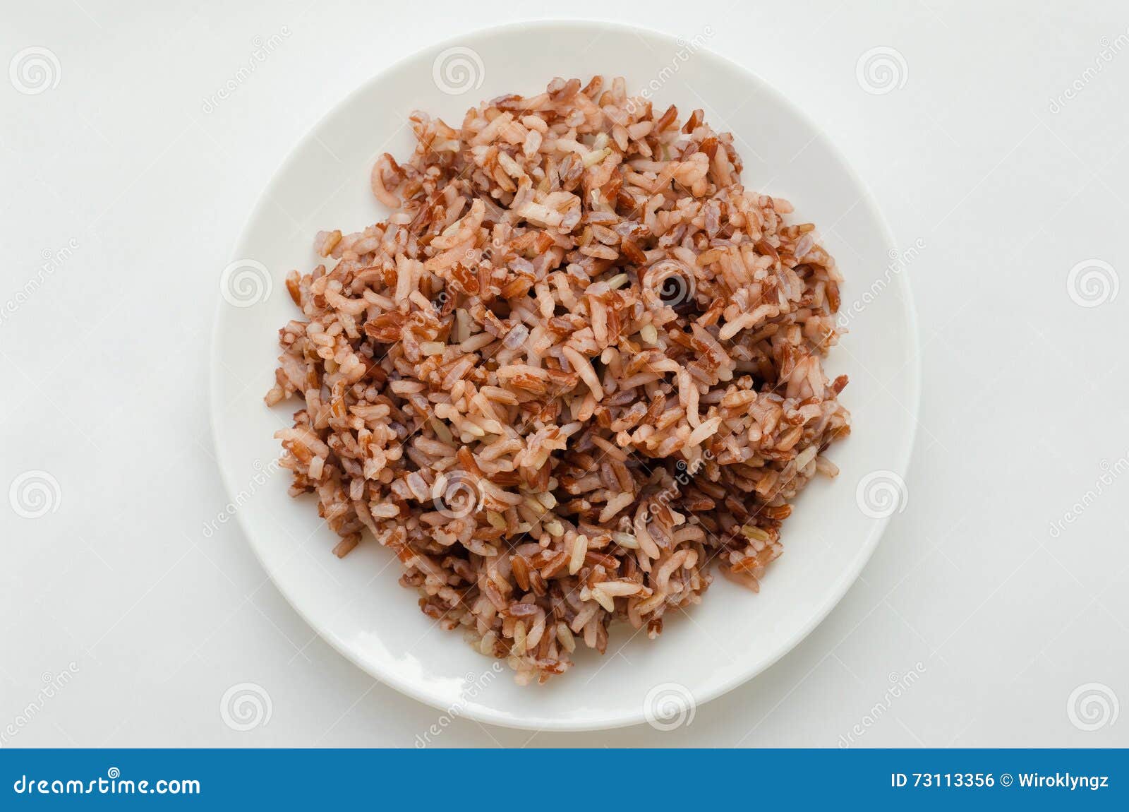 Brown Rice on White Plate. stock photo. Image of cooked - 73113356