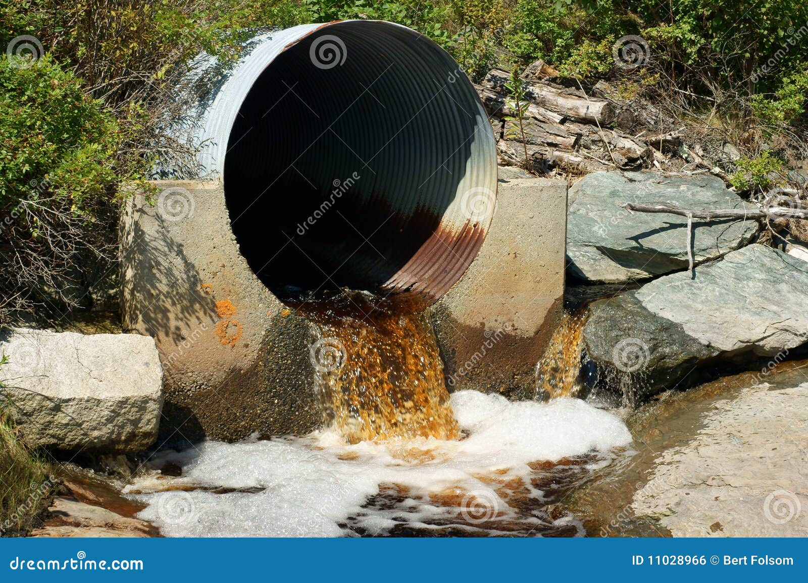 Brown Runoff Water from Rusted Culvert Stock Photo - Image of pouring ...