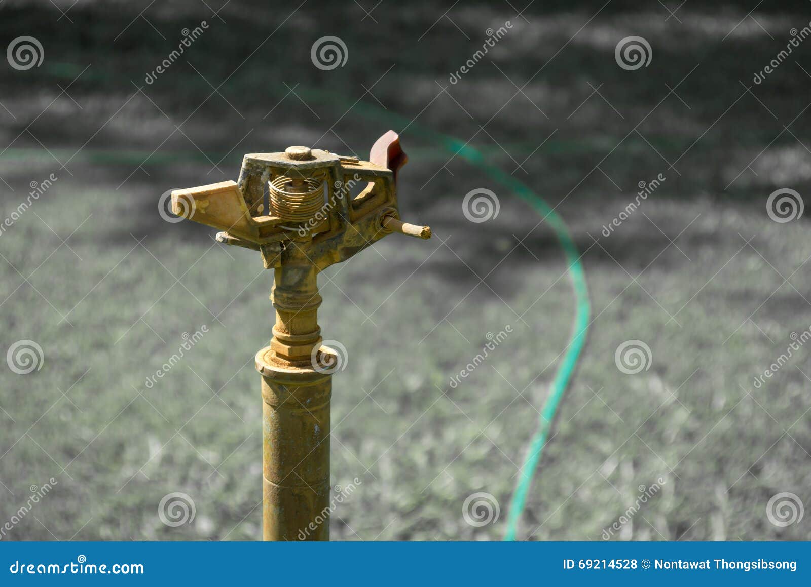 Brown rusty sprinkler stock photo. Image of summer, grass - 69214528