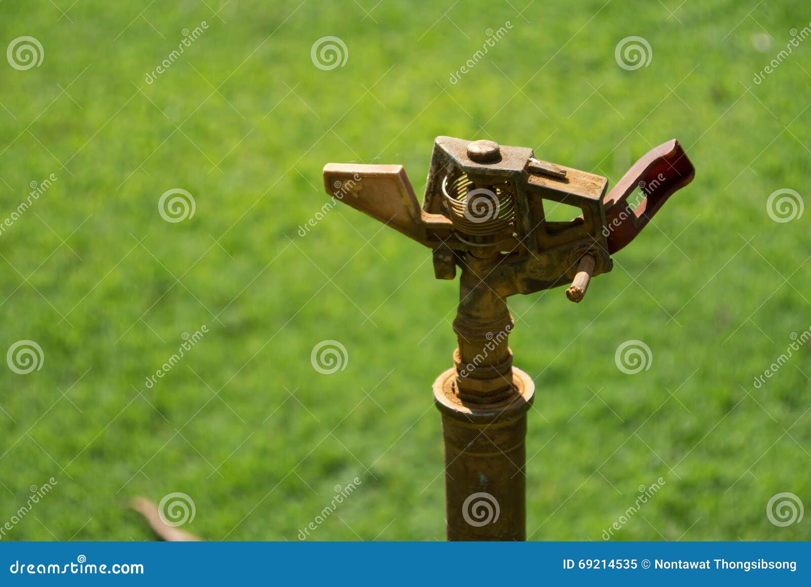Brown rusty sprinkler stock image. Image of garden, yard - 69214535