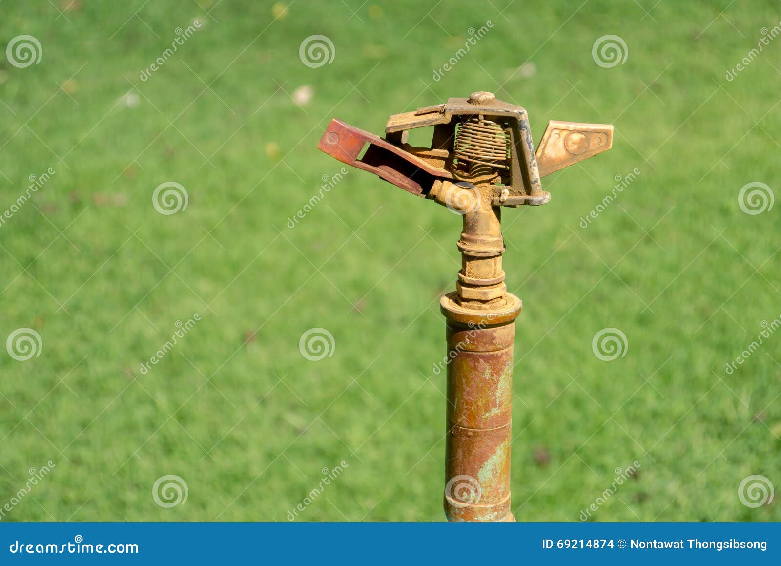 Brown rusty sprinkler stock photo. Image of yard, automatic - 69214874