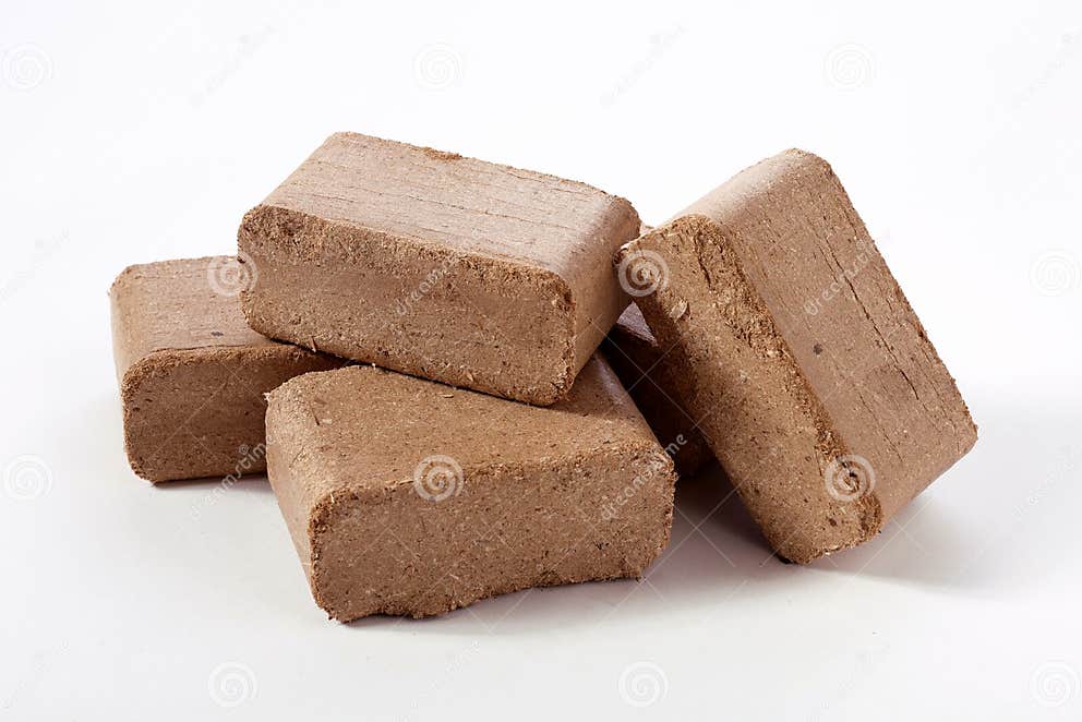 Brown Solid Fuel Briquettes on White Surface Stock Photo - Image of ...